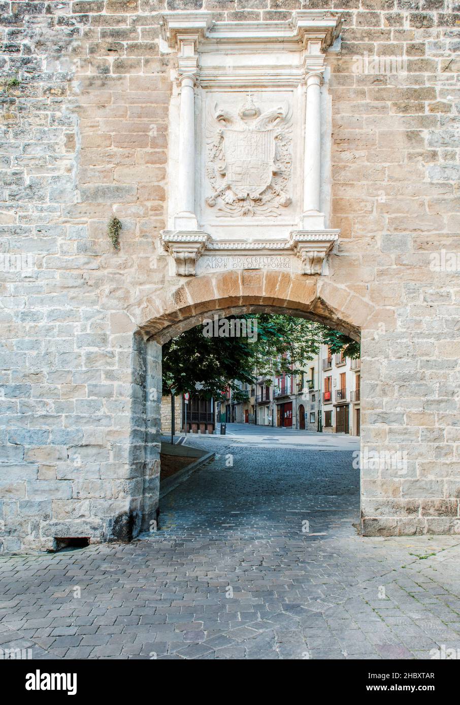 Brick arch in a wall with coat of arms on French Gare Stock Photo - Alamy
