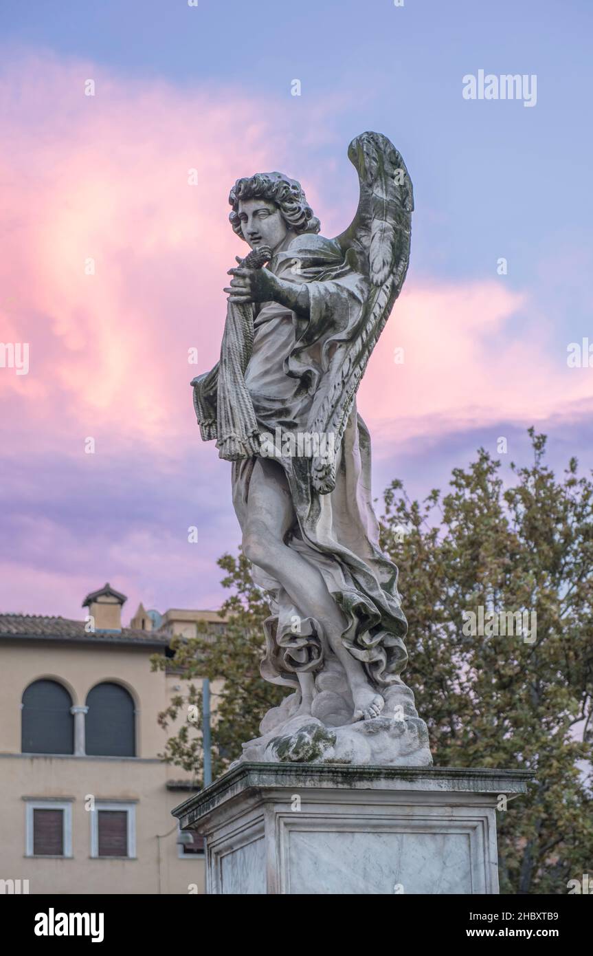 Statue of an angel with wings, dawn sky Stock Photo - Alamy