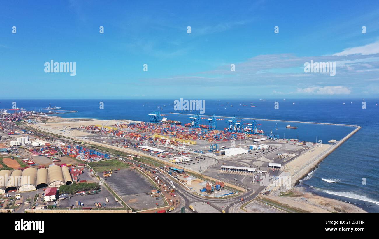 An aerial shot of the Tema seaport in Ghana under the cloudy skies ...