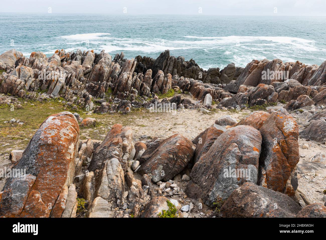 Jagged rocks and the rocky coastline of the Atlantic, vertical rock ...