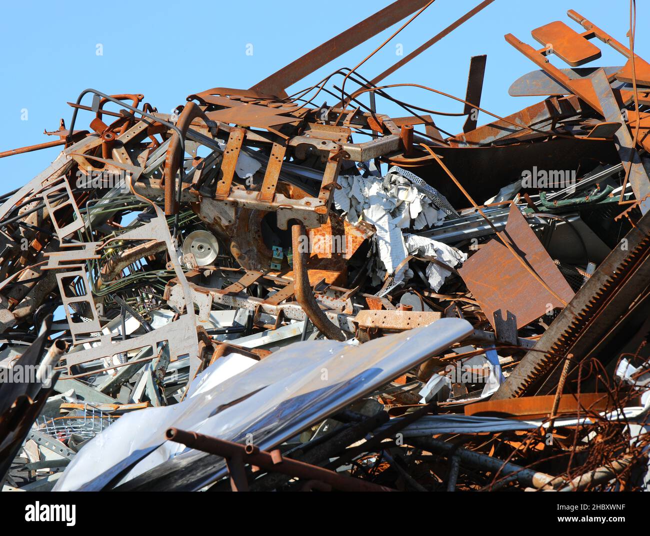 pile of many rusty pieces of iron in the recycling center for the ...