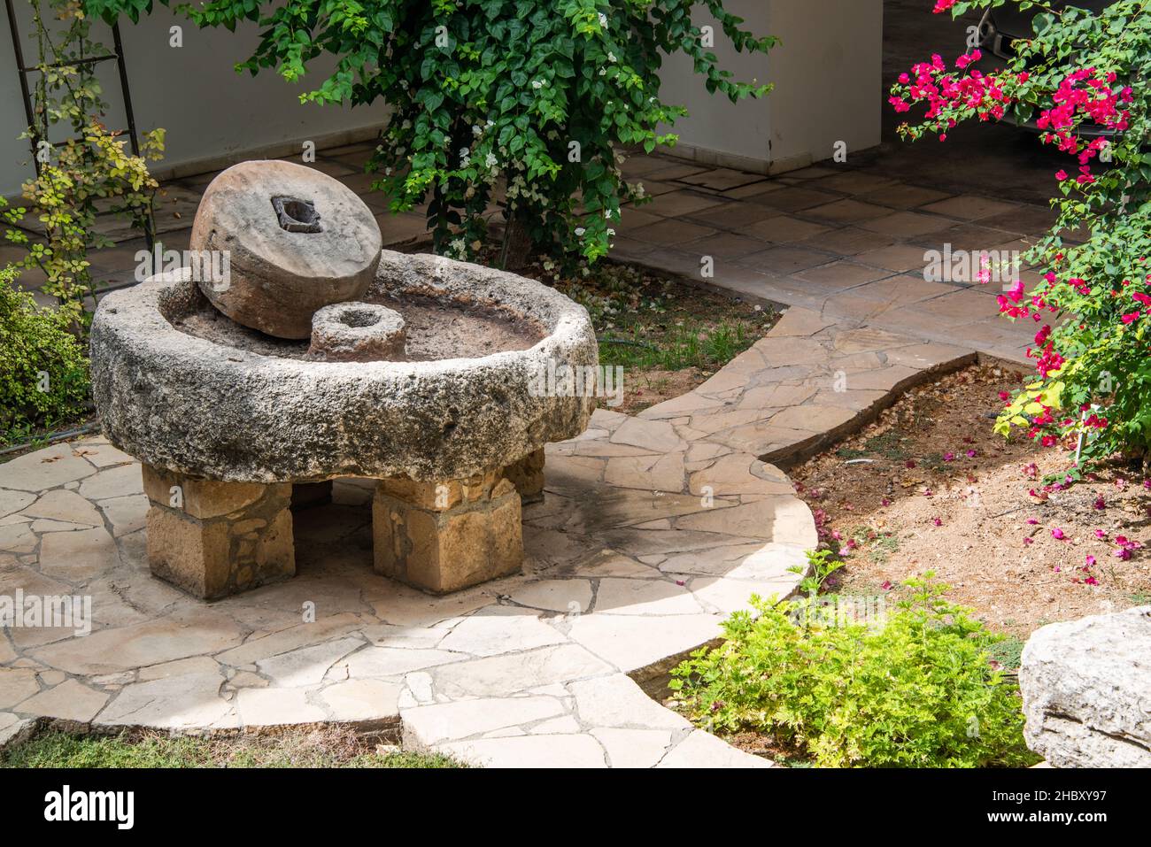 Ancient Cypriot millstone / grindstone, Paphos, Cyprus Stock Photo - Alamy