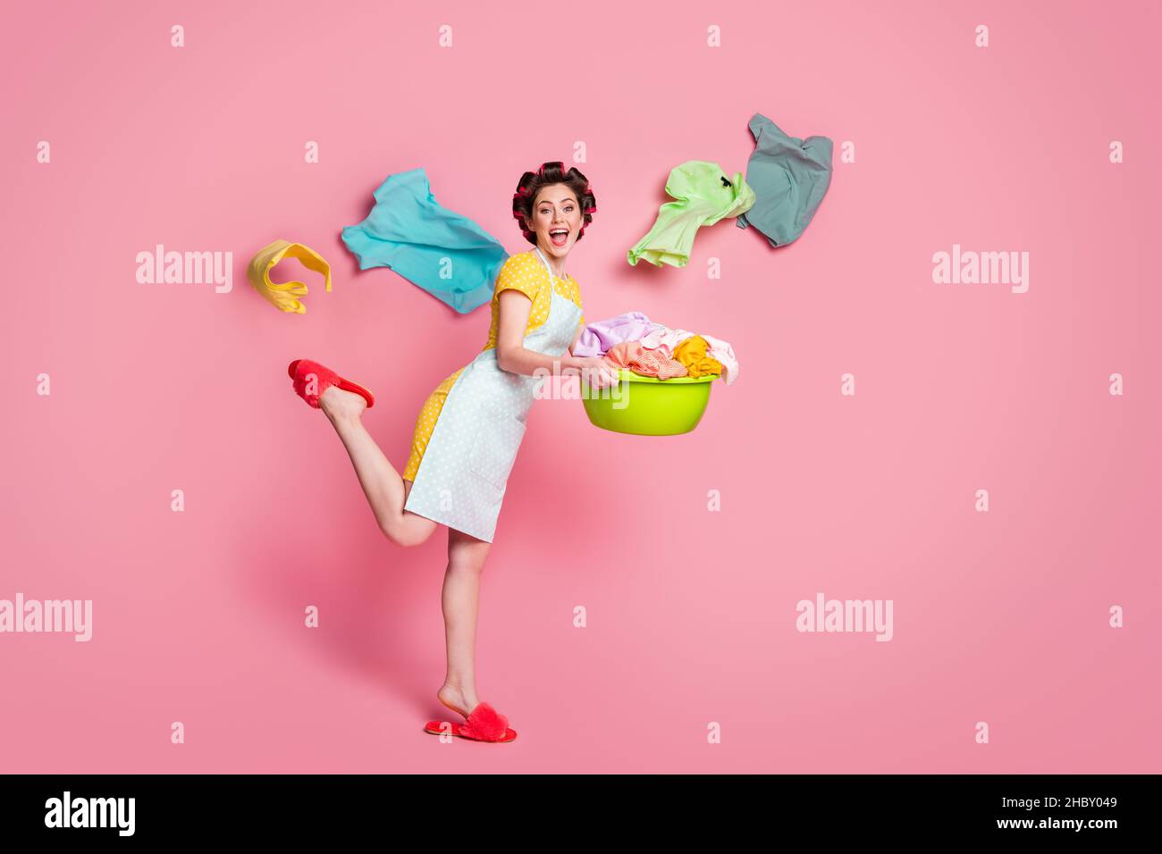 Full length body size view of pretty excited cheerful housemaid doing ...