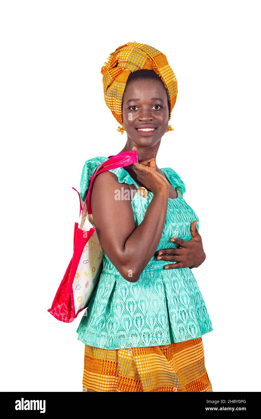 a beautiful african woman in traditional clothes standing on white ...