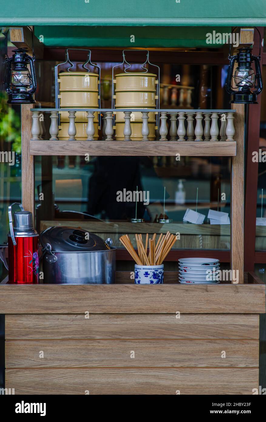 Front view vintage style noodle shop tone. Wooden counter display in ...