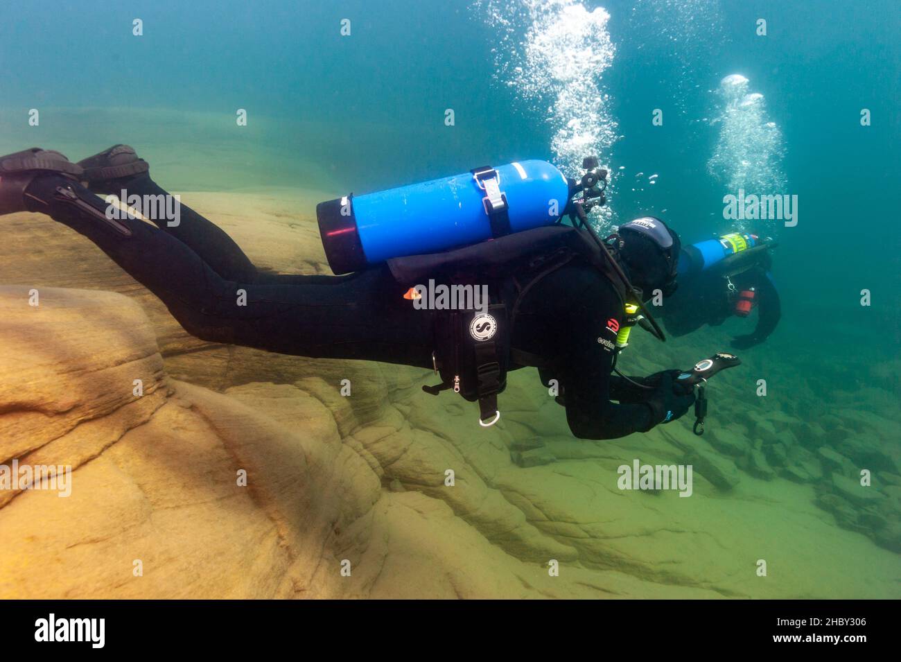 Munising, MI -August 14th, 2021: SCUBA diver checking gauges underwater ...