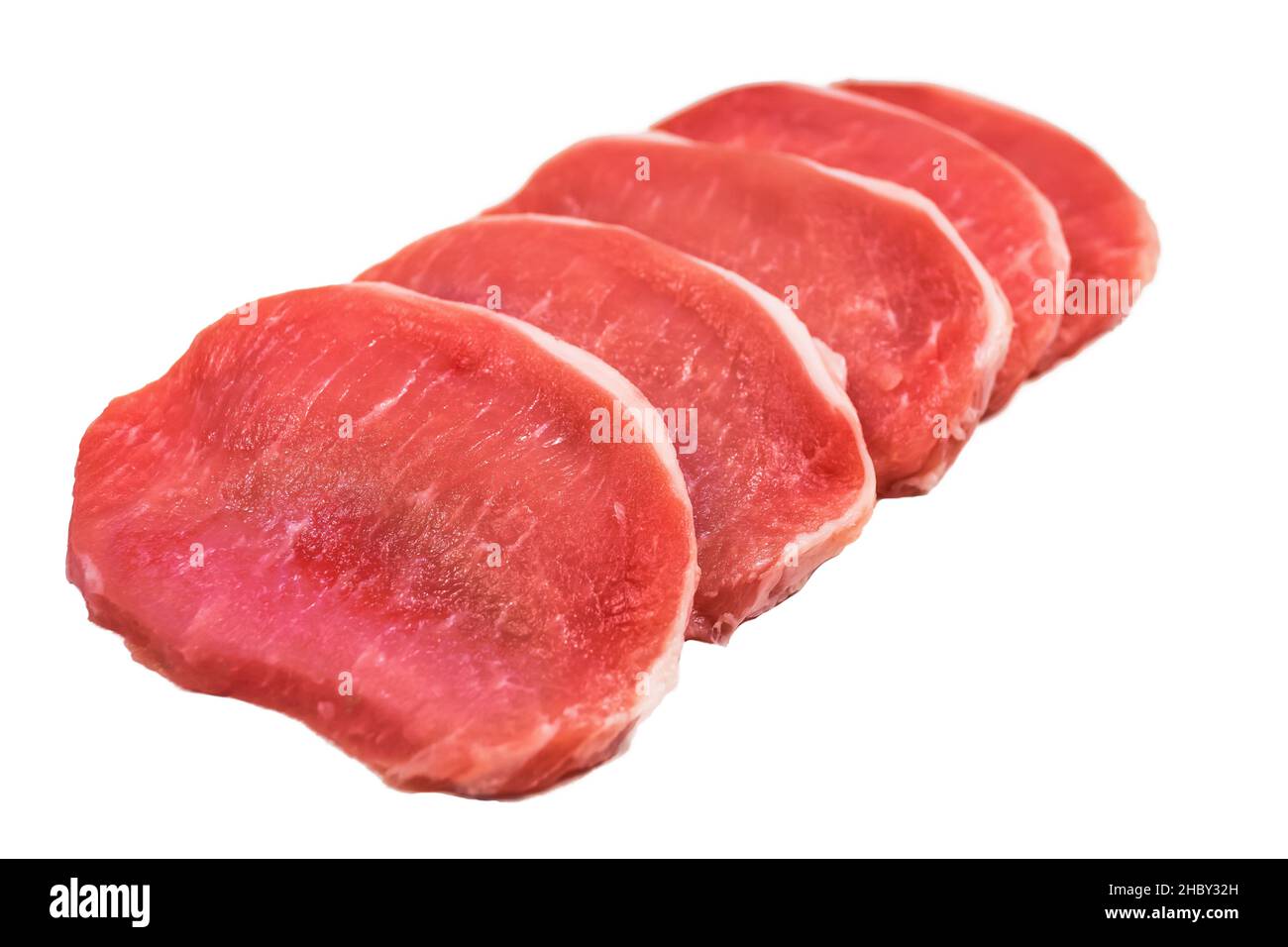 Five pieces of pork meat isolated on white background Stock Photo - Alamy