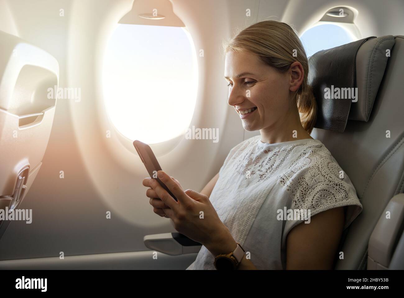Woman flight plane hi-res stock photography and images - Alamy
