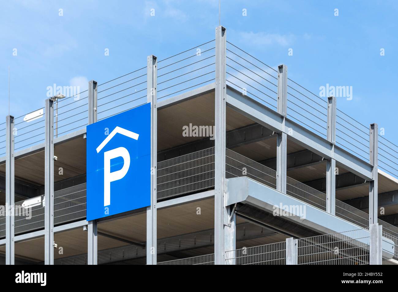 parking sign on a building, steel construction of a parking garage ...