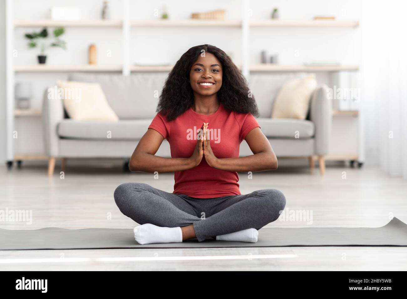 African american woman meditating hi-res stock photography and images ...