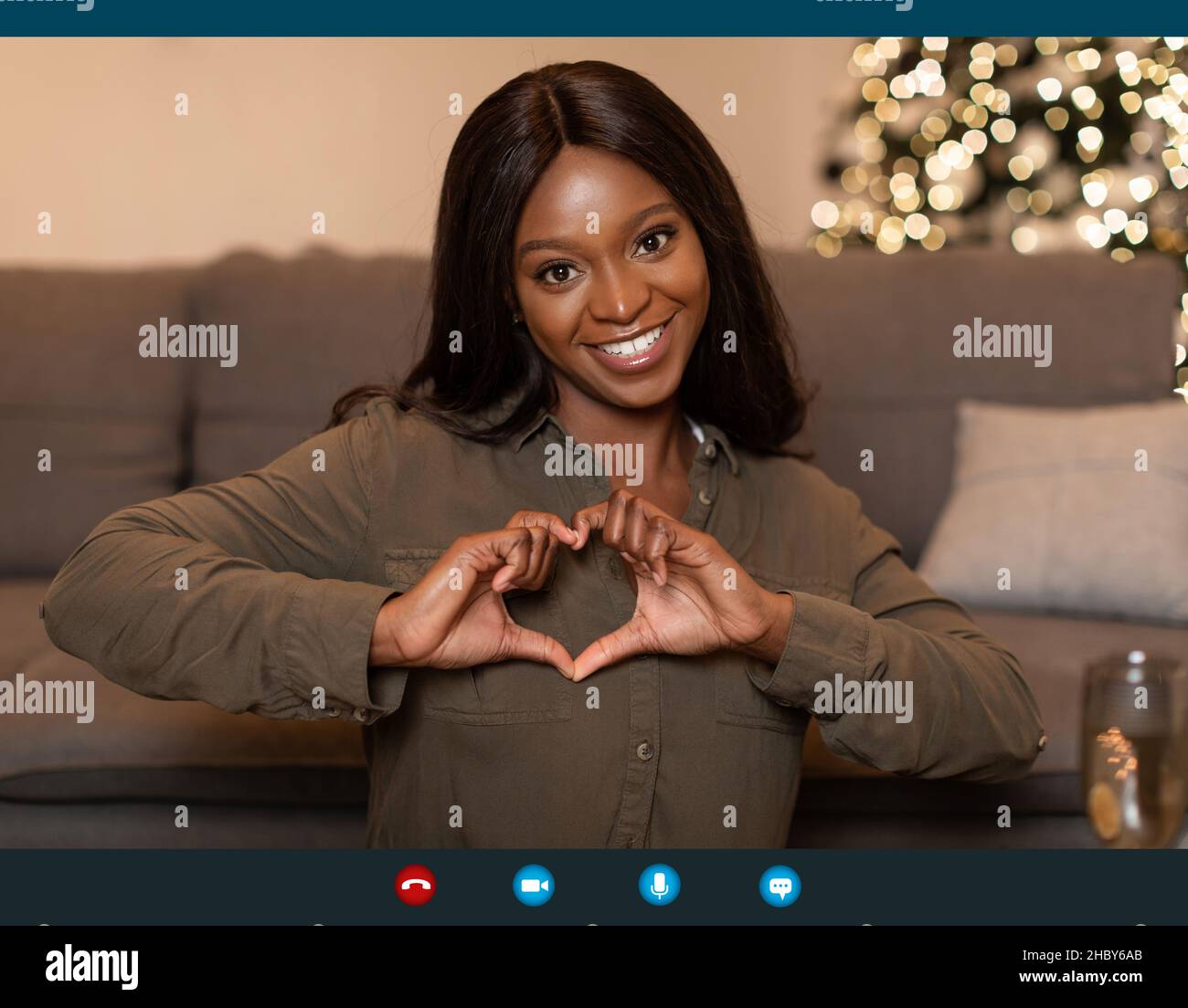 Video Call Screenshot With African Woman Gesturing Heart Shape Indoor ...