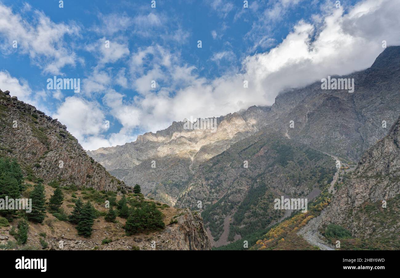 Mountain landscape panorama. A beautiful gorge on a sunny day, bright ...