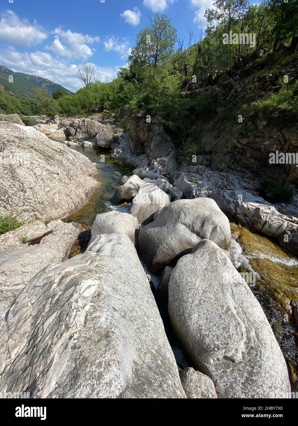Large rocks in front of Chassezac river in the Lozere district in ...