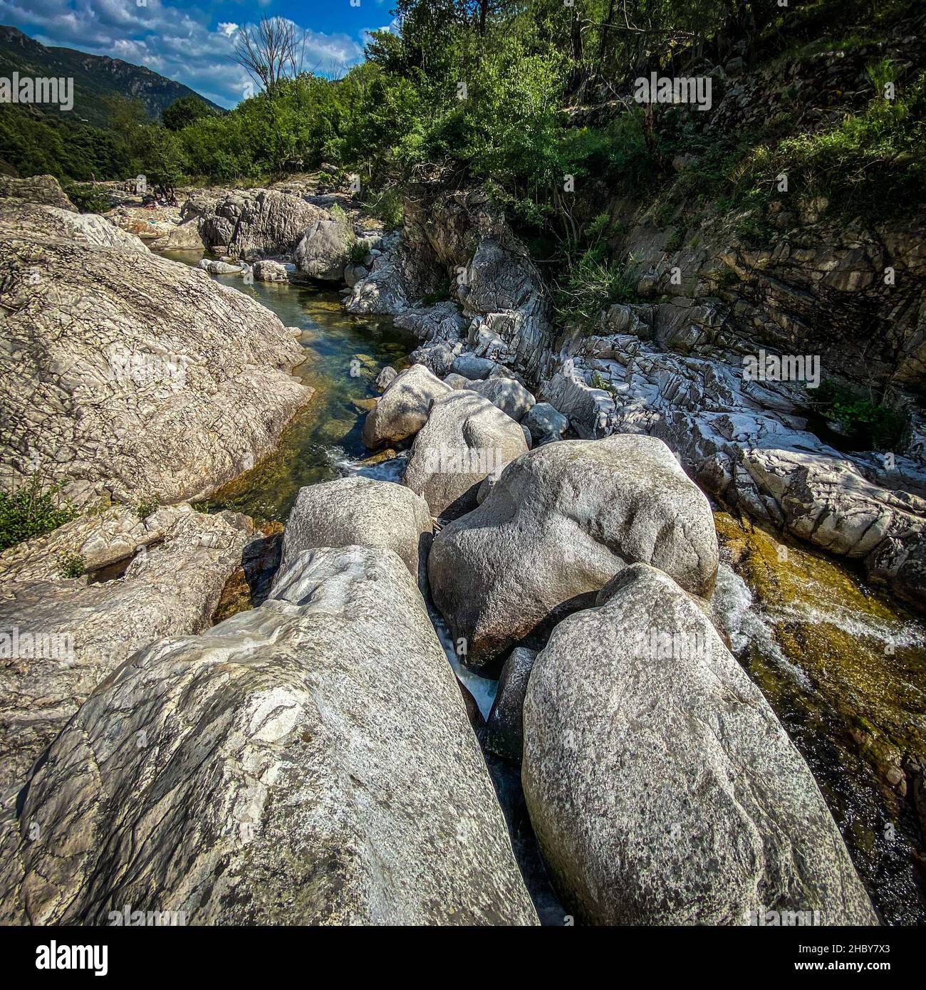 Large rocks in front of Chassezac river in the Lozere district in ...