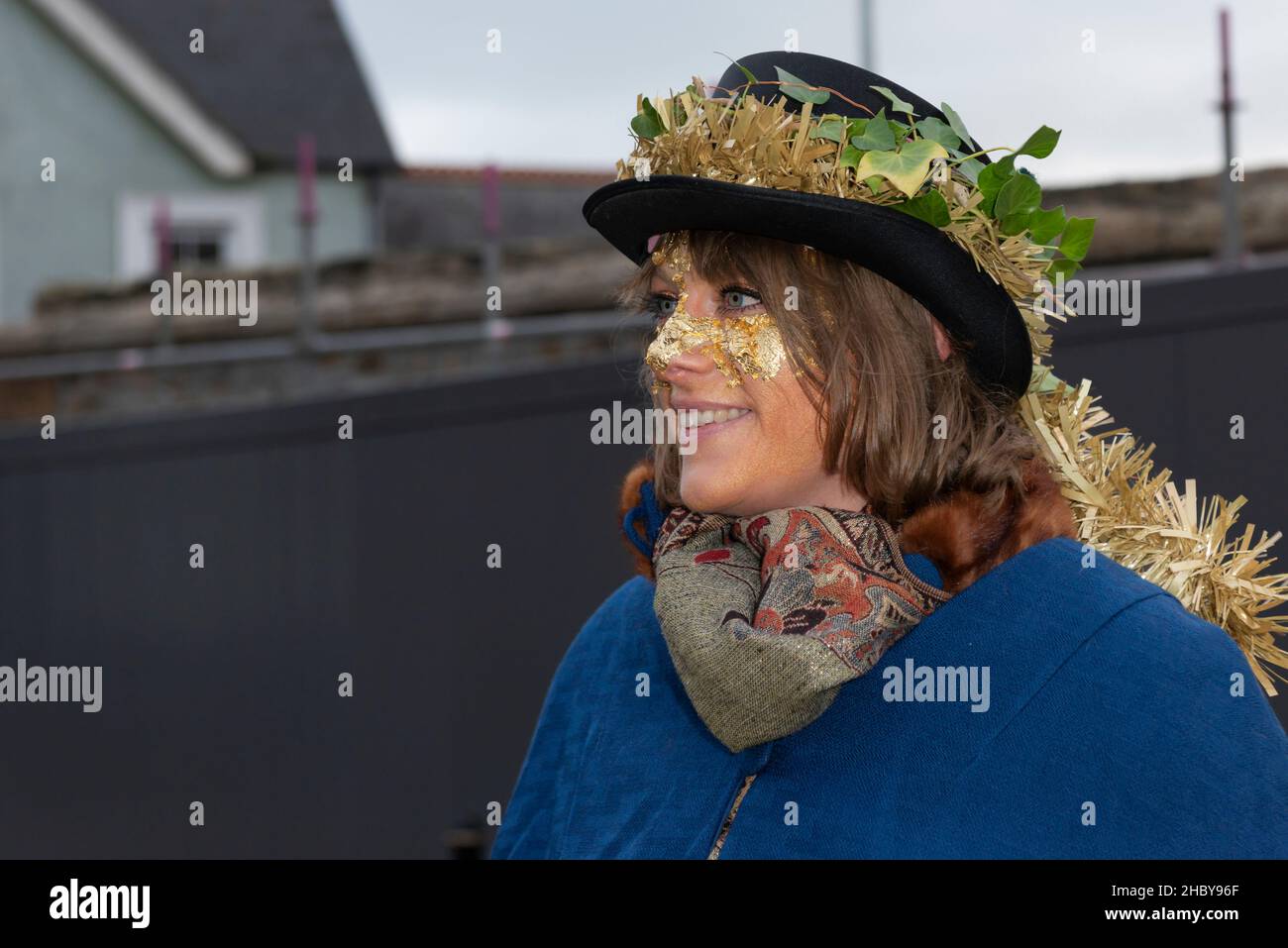 A participant in the Montol Festival parade; in Penzance in Cornwall ...