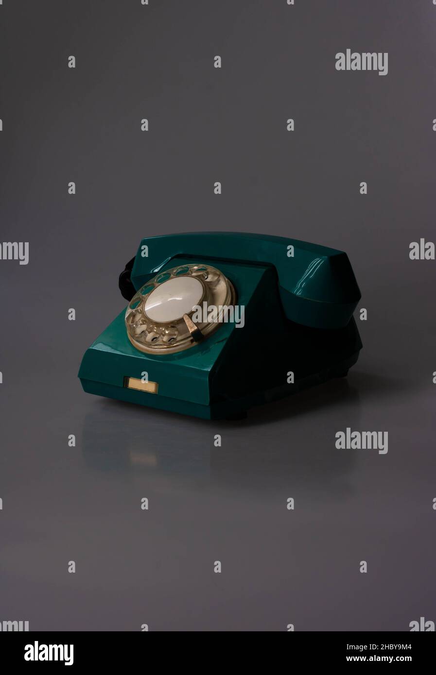 Retro swivel green phone on dark background Stock Photo - Alamy