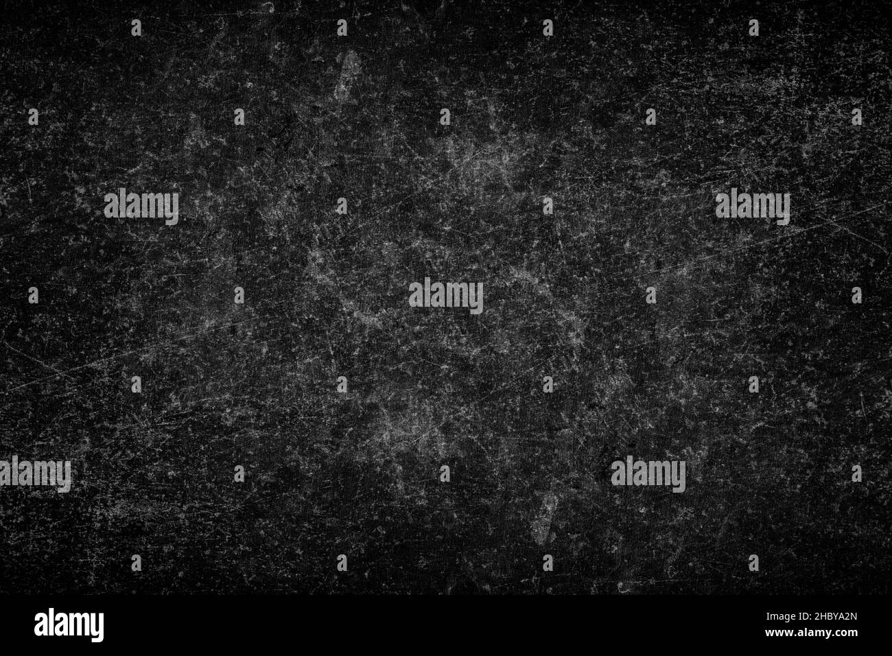 Heavy scratches and spots texture on a black metal sheet for background ...