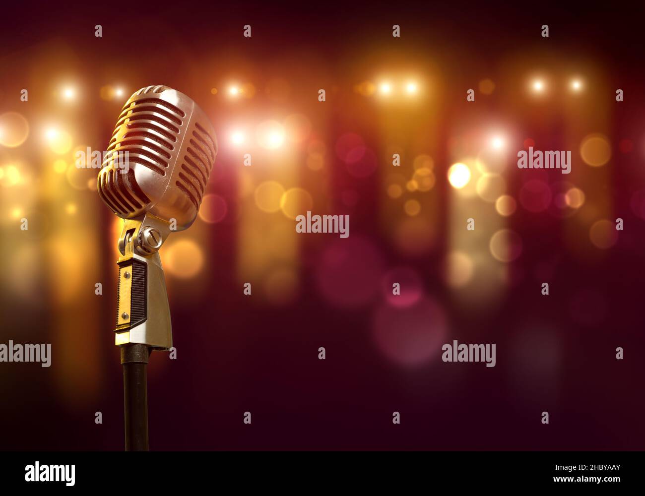 Microphone on stage Stock Photo - Alamy
