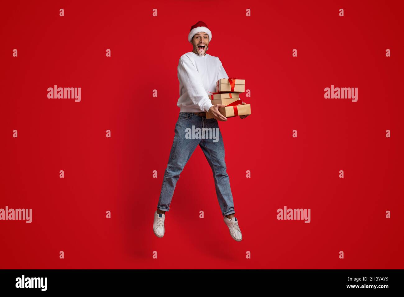 Jumping gifts hi-res stock photography and images - Alamy