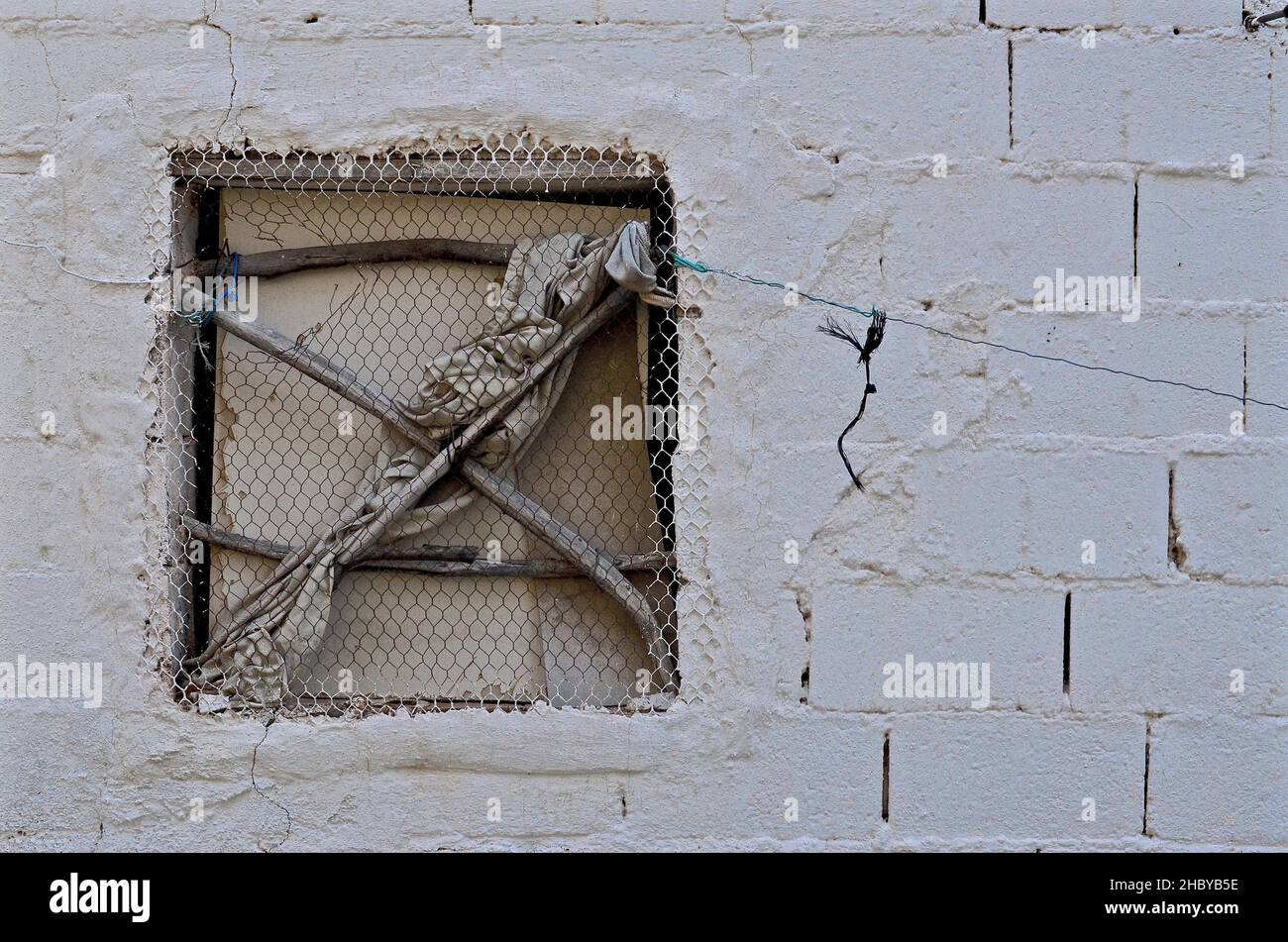 Primitive barred stable window, Andalusia, Spain Stock Photo - Alamy