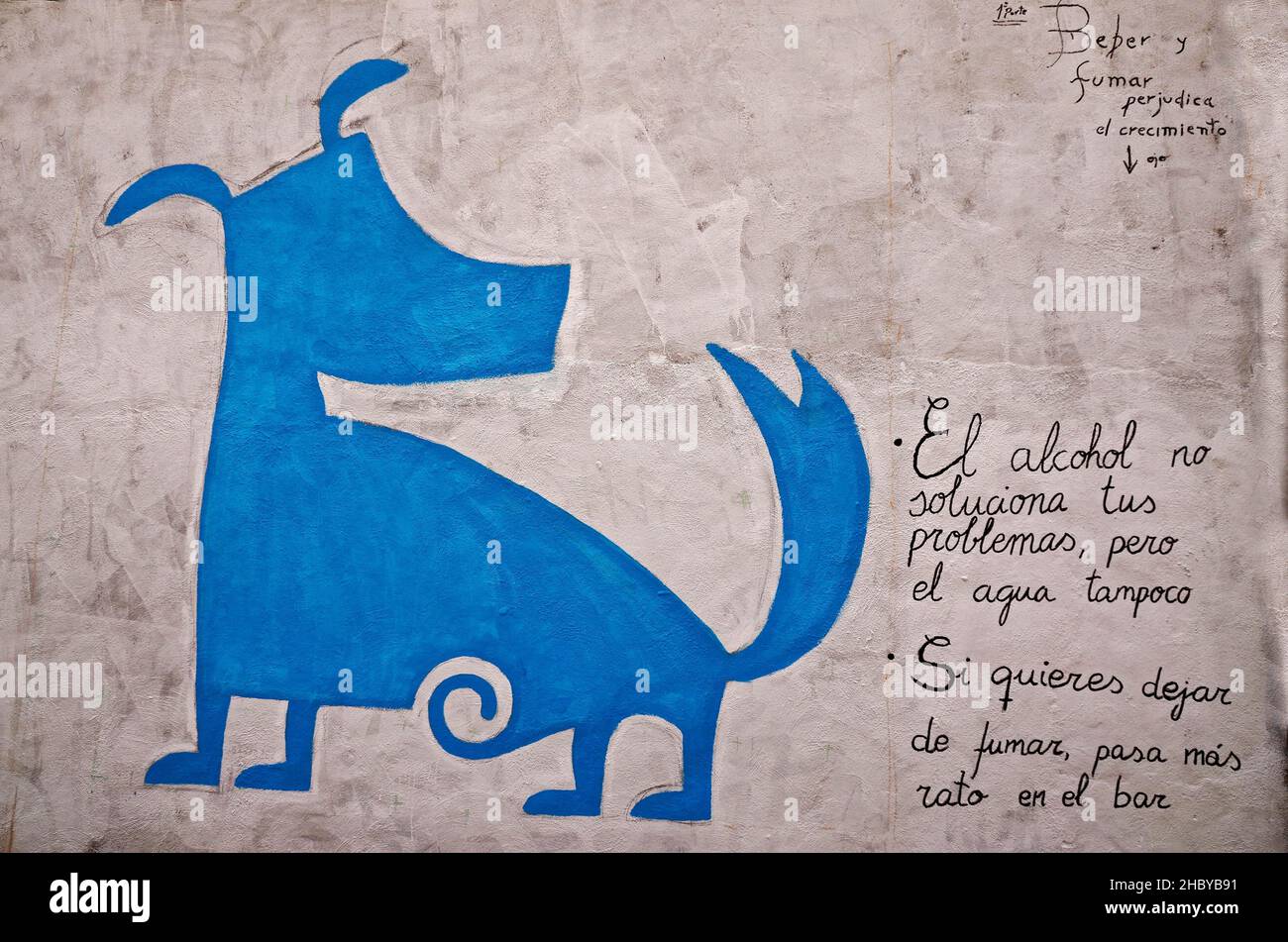 Graffiti with saying and blue dog, mural of a dog, Spain Stock Photo ...