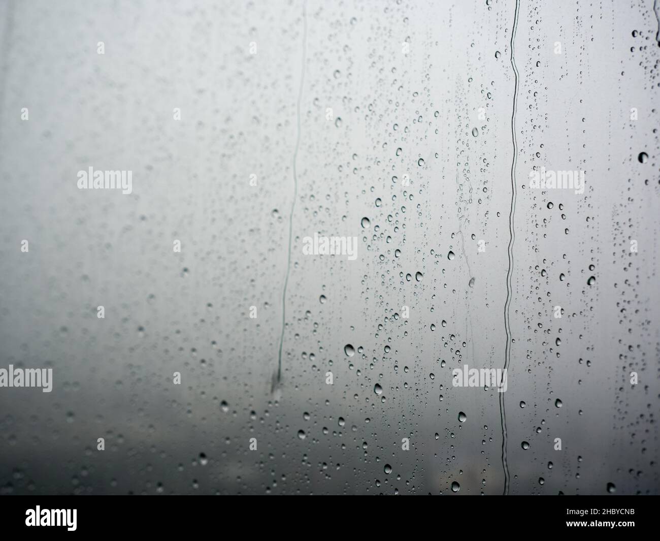 Background of rain drops on windows glass Stock Photo - Alamy