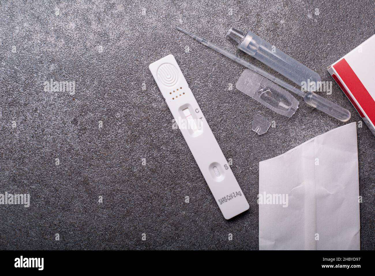 Saliva antigen test kit with copy space for check coronavirus ...