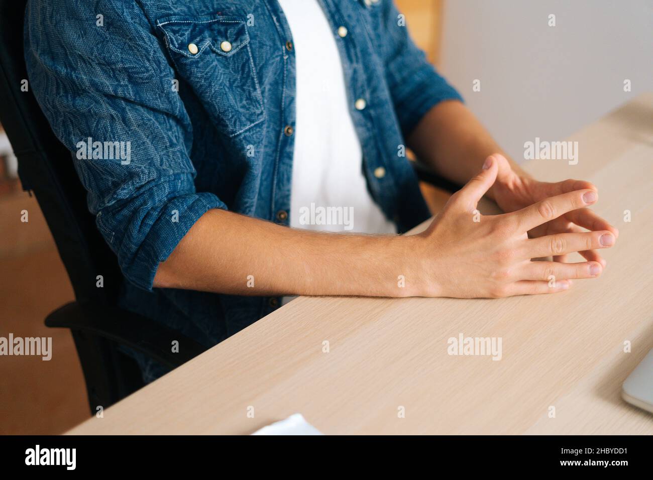 Unrecognizable nervous businessman sitting in hi-res stock photography ...