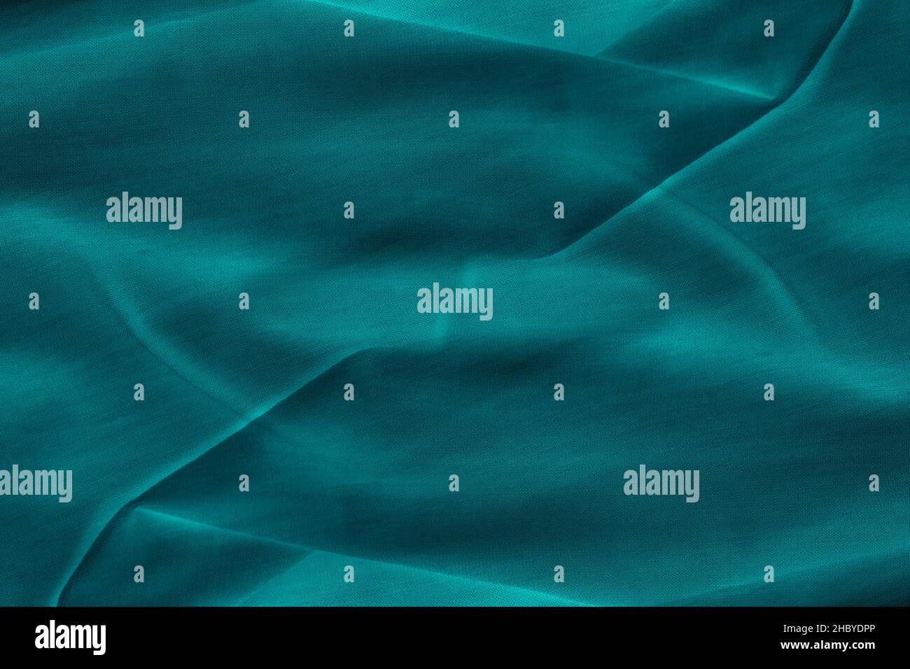 Cyan wrinkled fabric hi-res stock photography and images - Alamy