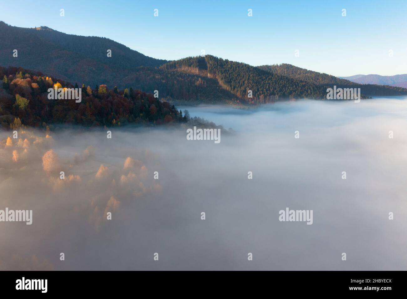 Thick layer fog covering mountains hi-res stock photography and images ...