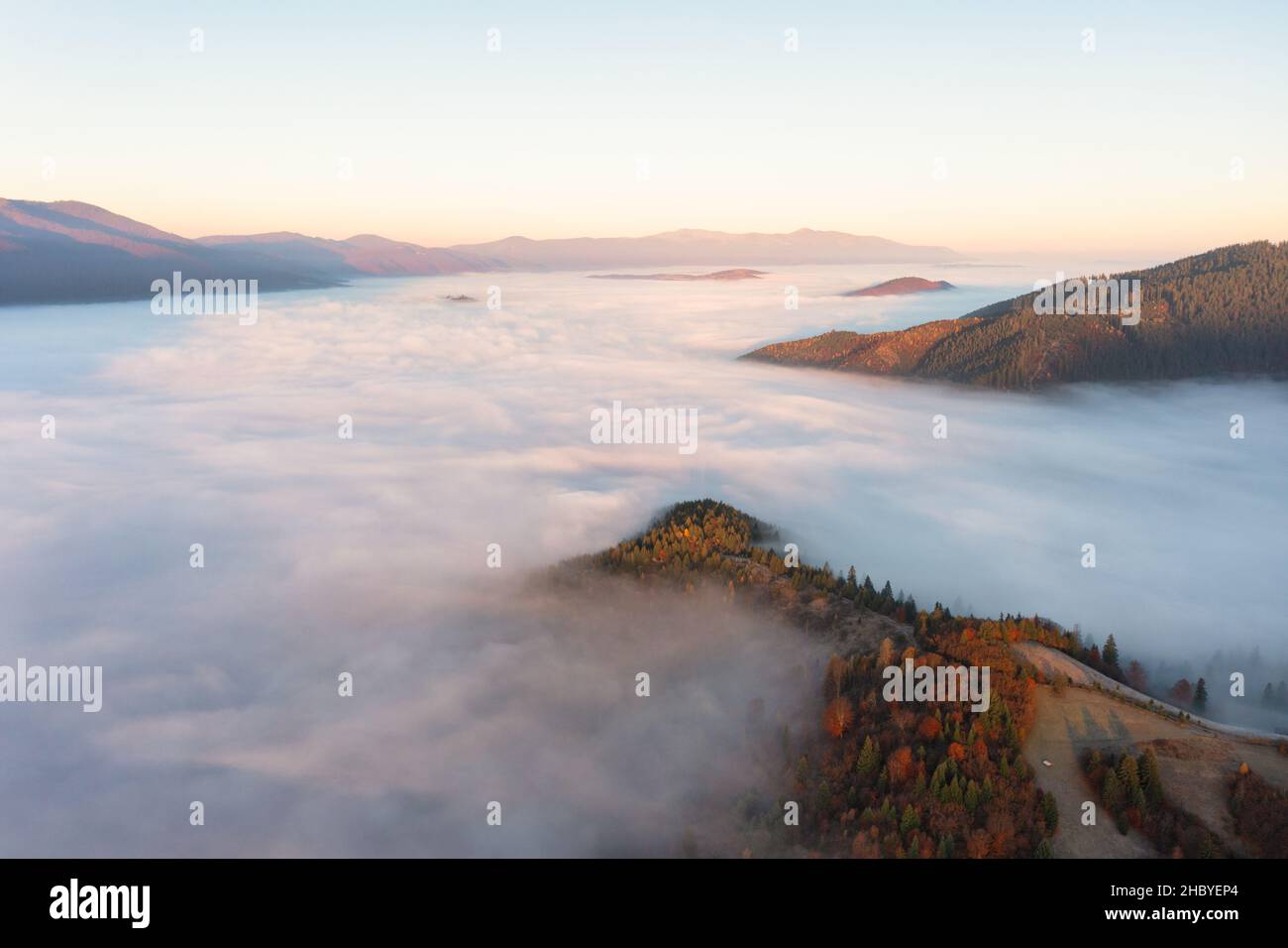 Thick layer fog covering mountains hi-res stock photography and images ...