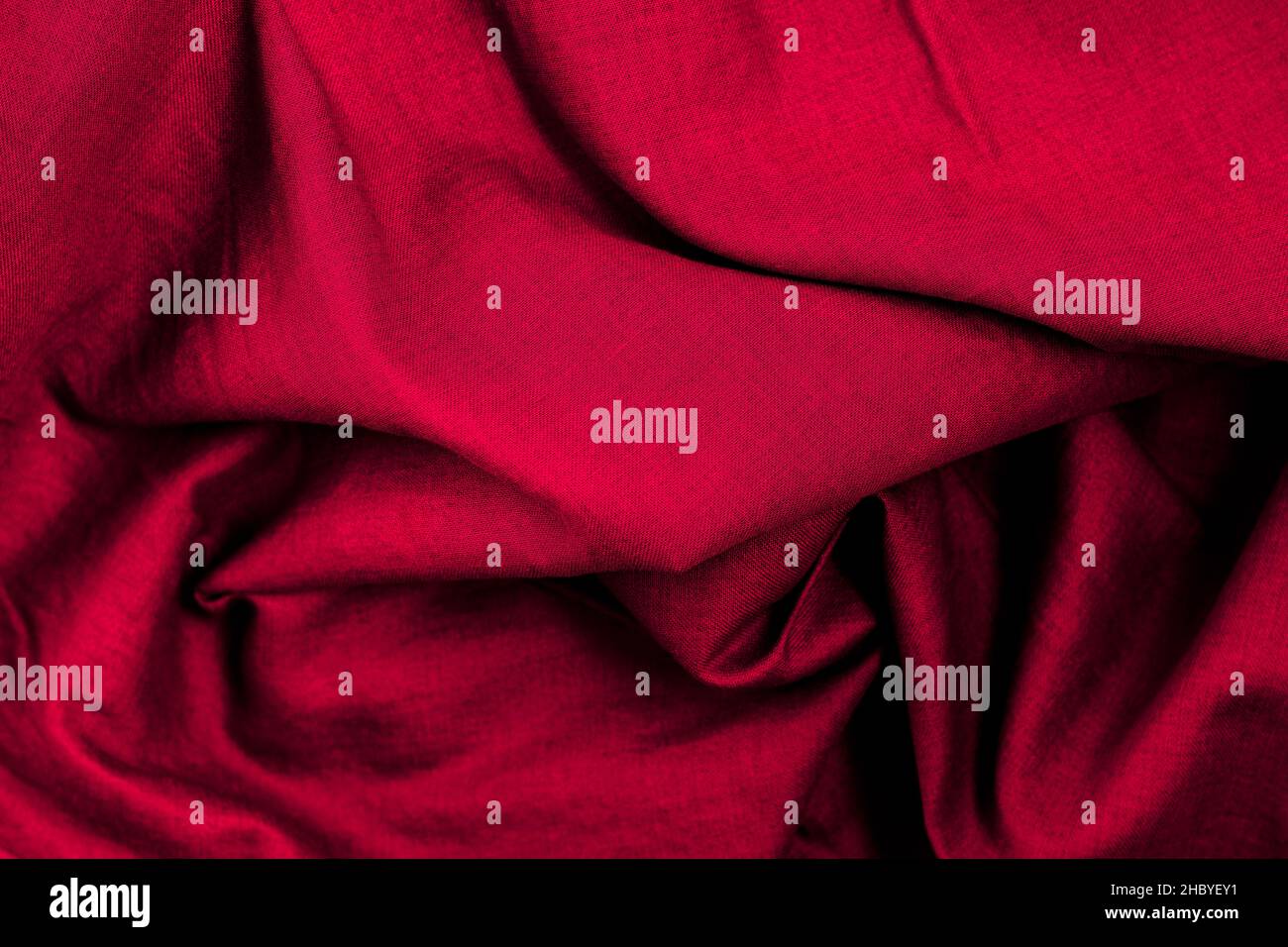 Close up top view of folded red cloth with texture for fabric ...