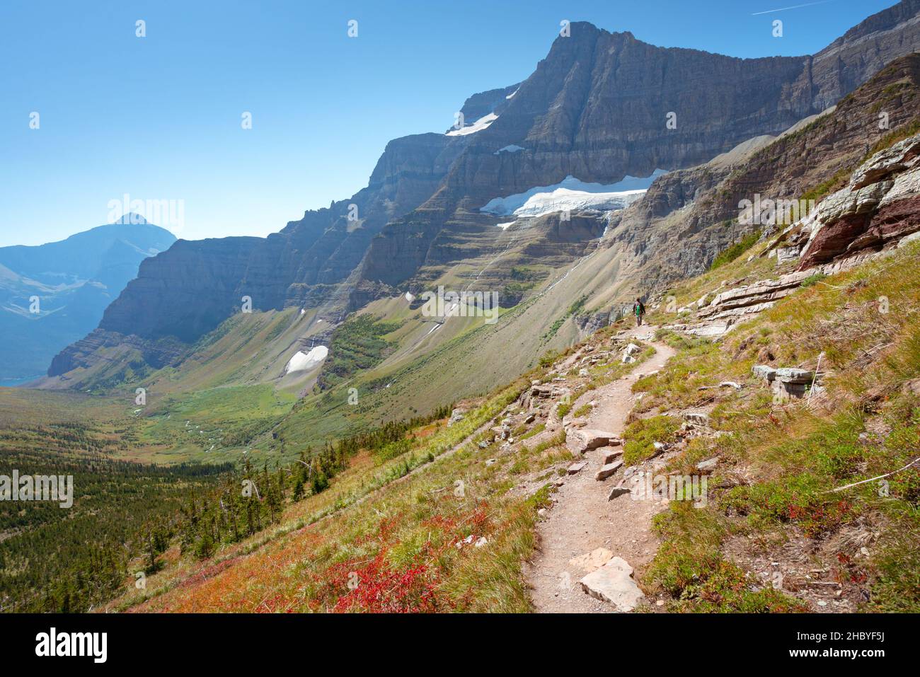 Matahpi Peak and valley below viewed from Siyeh Pass hiking trail ...