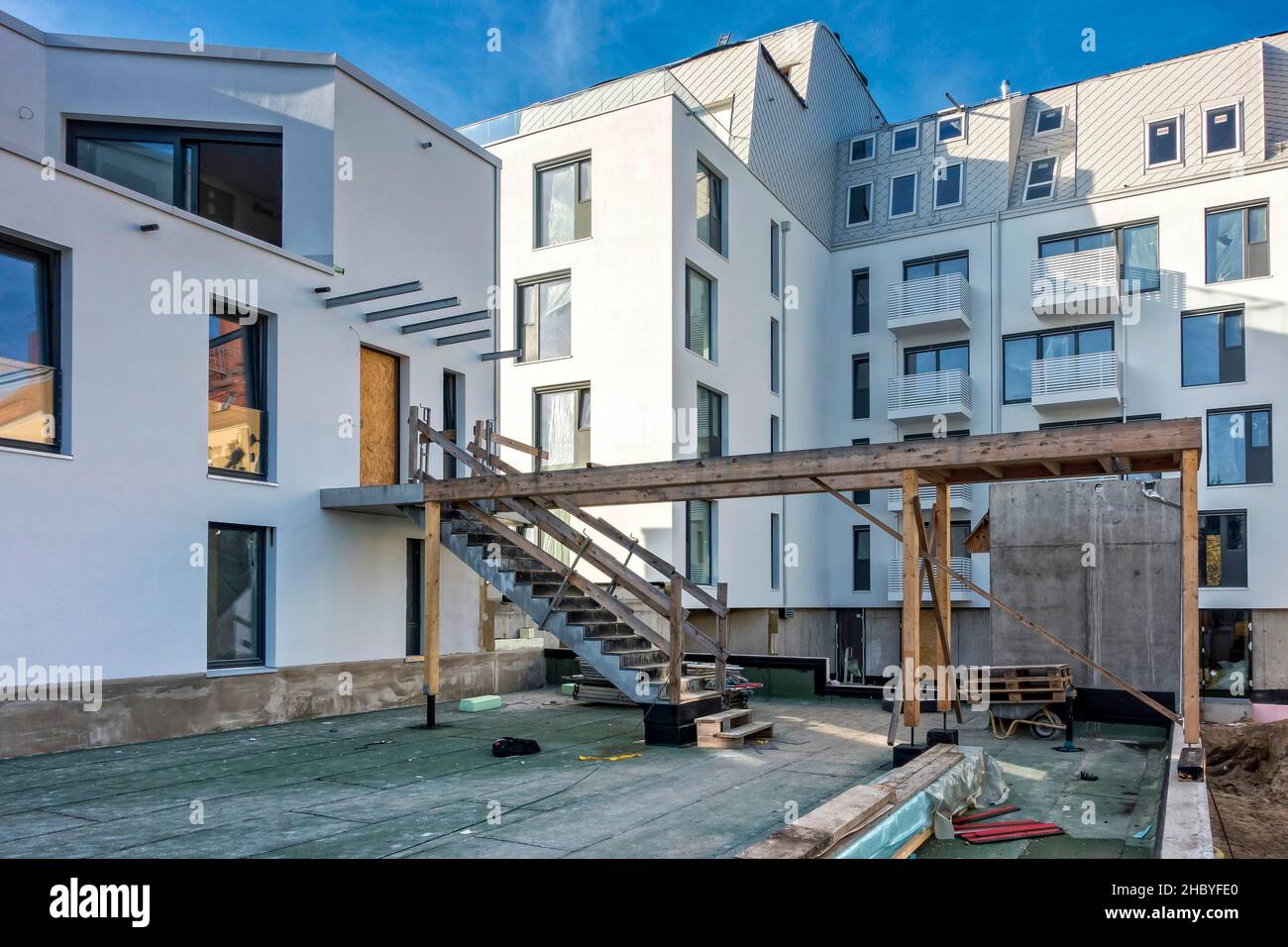 Construction site, temporary wooden staircase at an apartment building ...