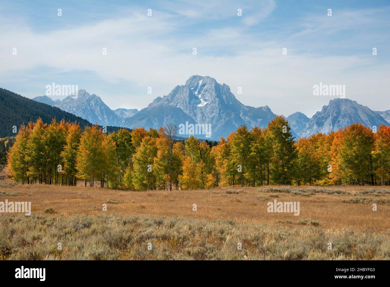 Mountain panorama of the Teton Range, summit of Mount Moran, autumn ...