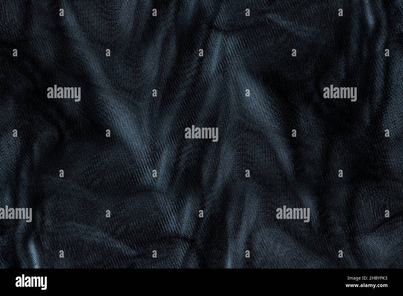 Folded shiny metallic cloth with dark texture for fabric background ...