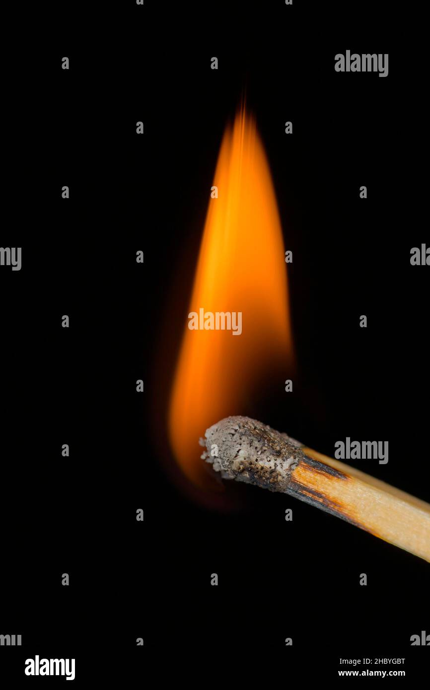 Flame on a match head, studio photography with black background Stock ...