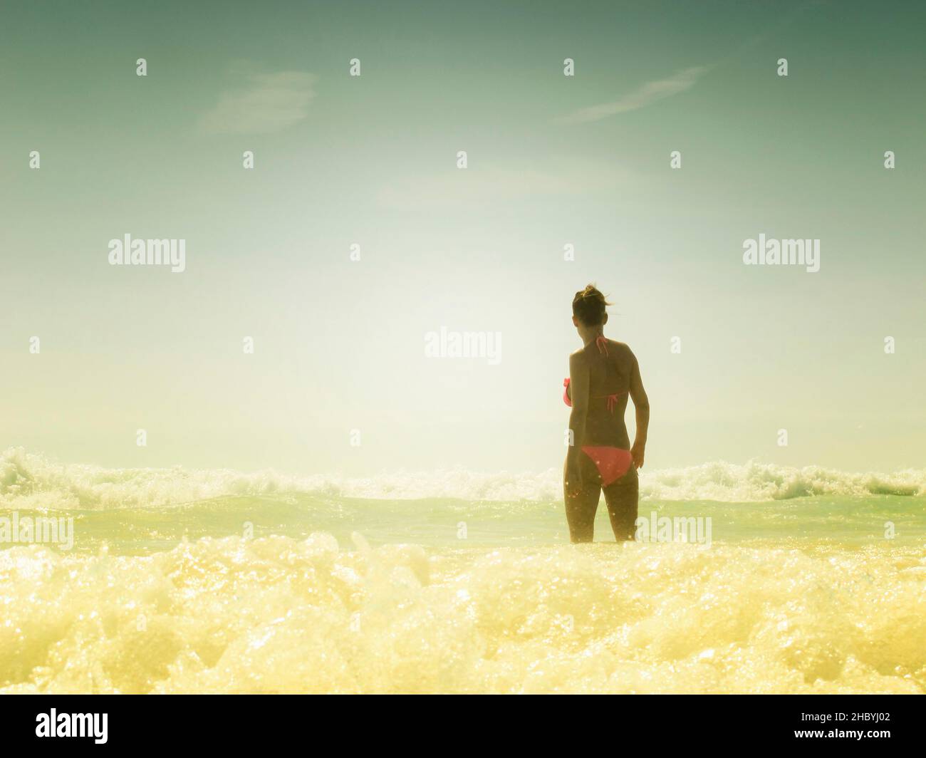 Woman bathing in the sea on the beach, Andalusia, Spain Stock Photo - Alamy