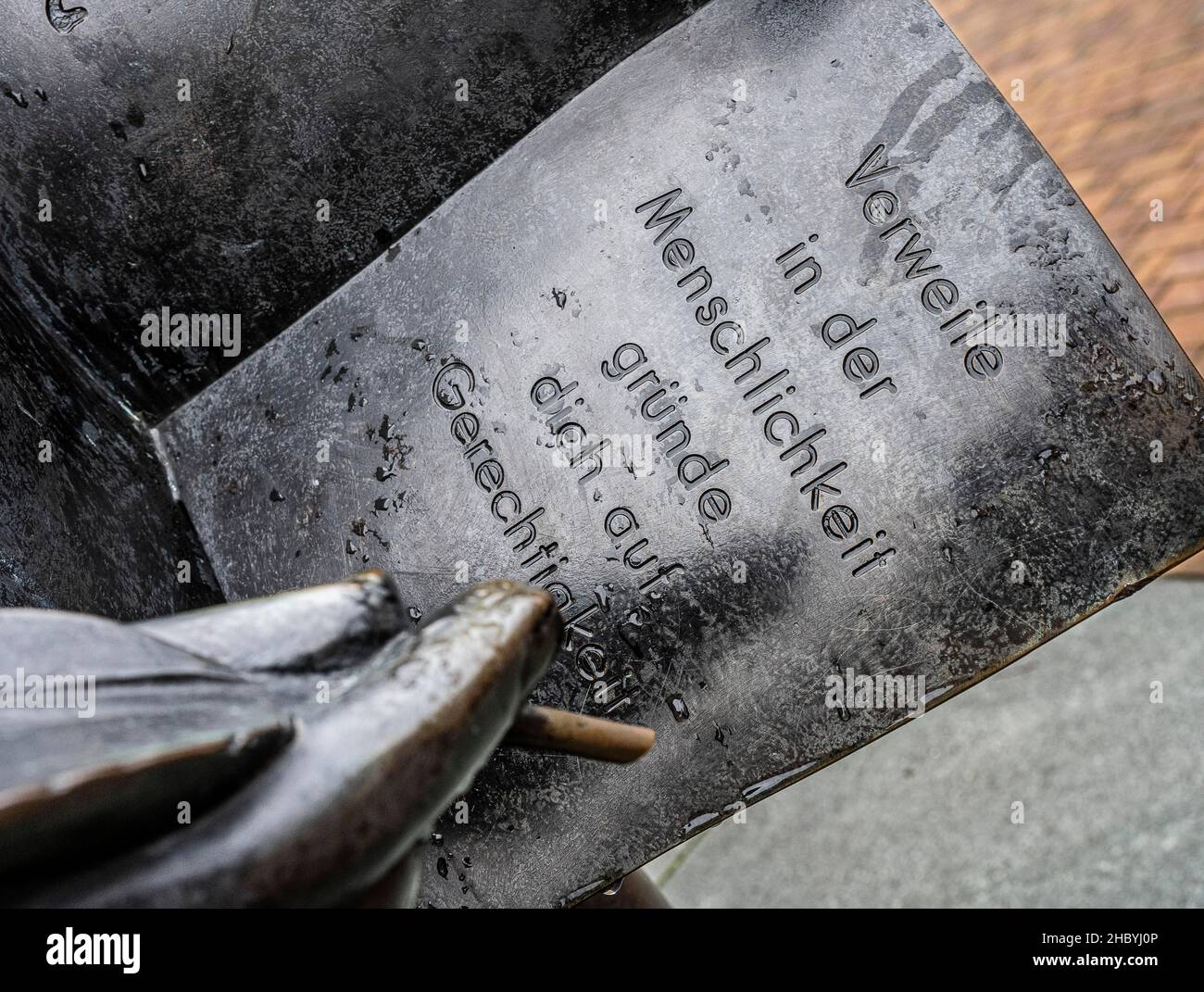 Bronze figure with book at the entrance to the Humboldt Library in ...