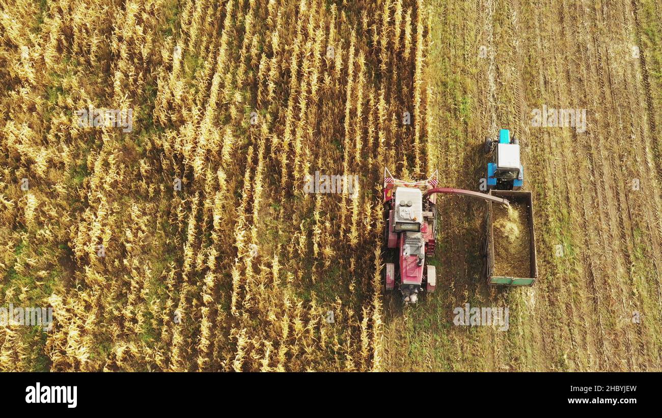 Aerial View Of Rural Landscape. Combine Harvester And Tractor Working ...