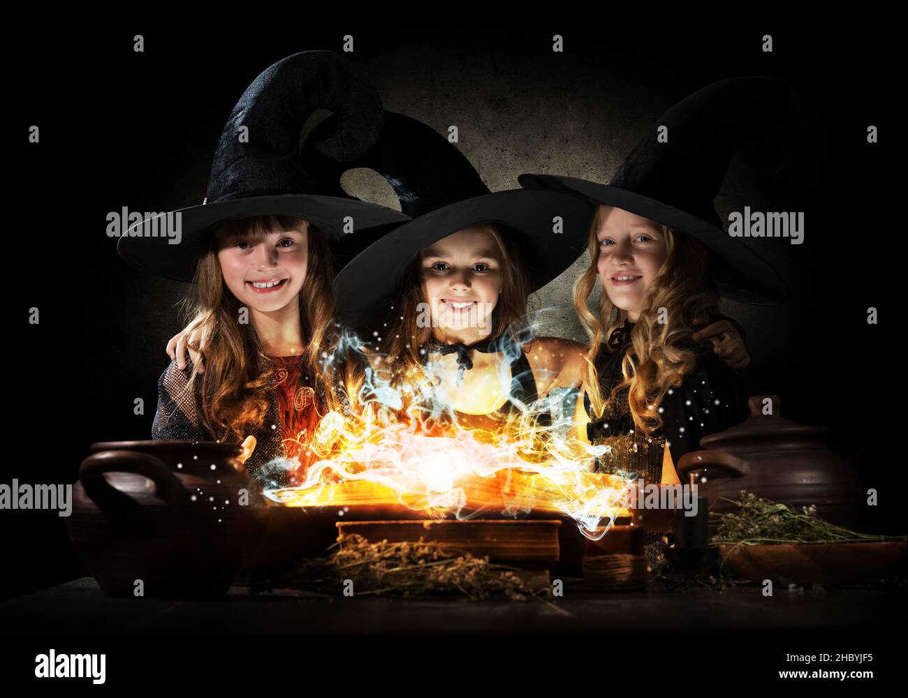 Three little witches Stock Photo - Alamy