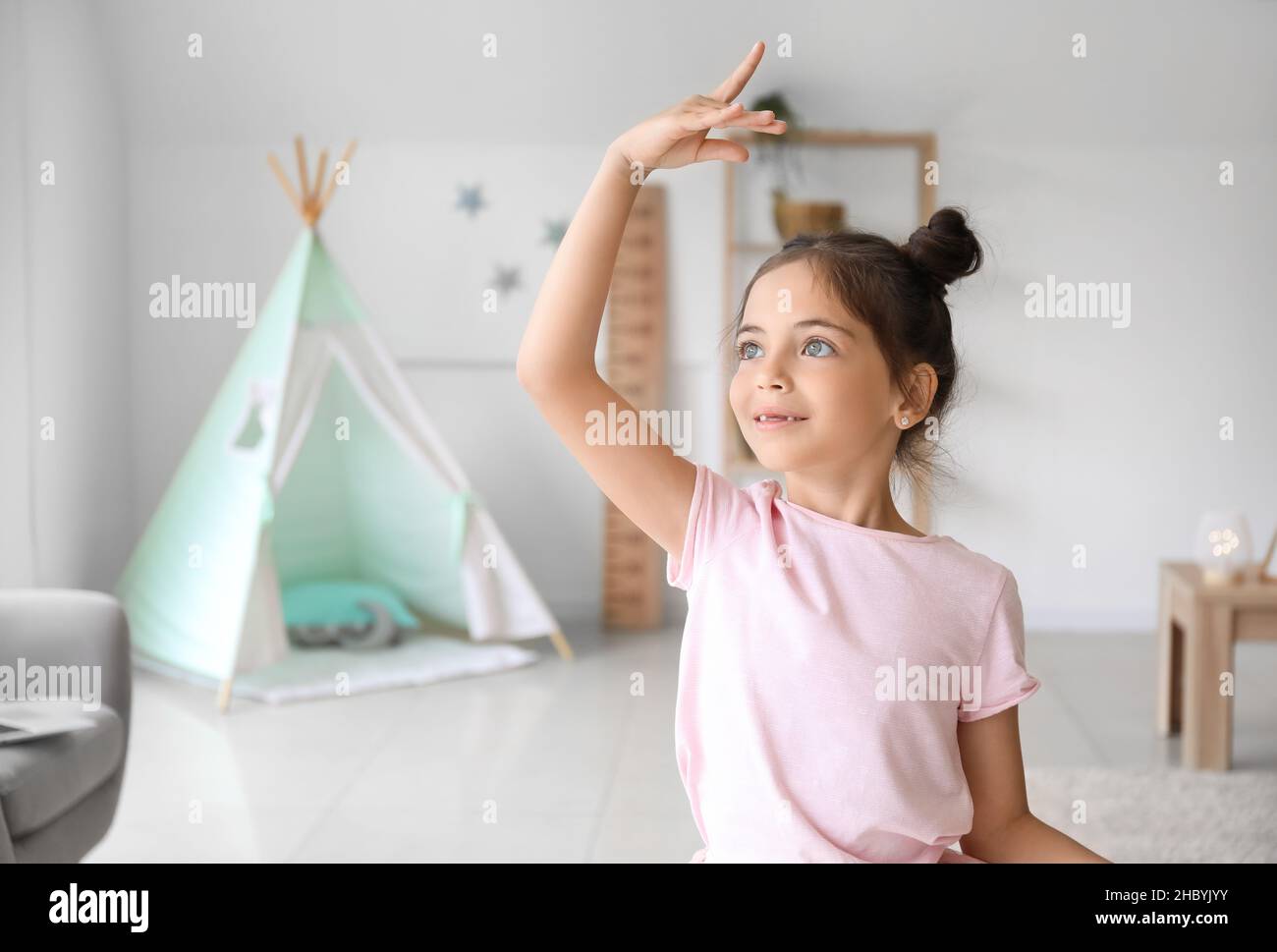 Adorable little ballerina dancing at home Stock Photo - Alamy