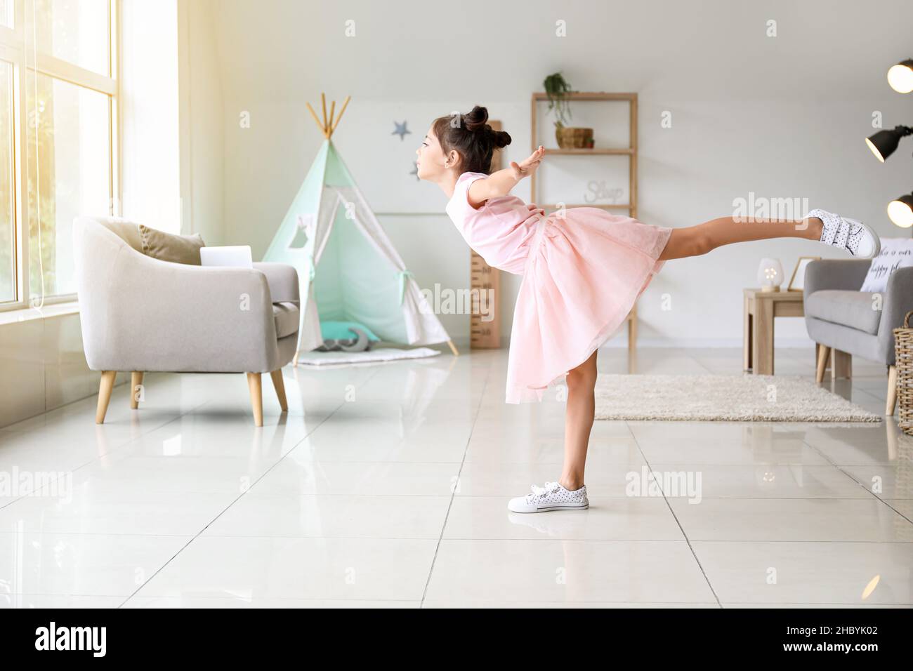Adorable little ballerina dancing at home Stock Photo - Alamy