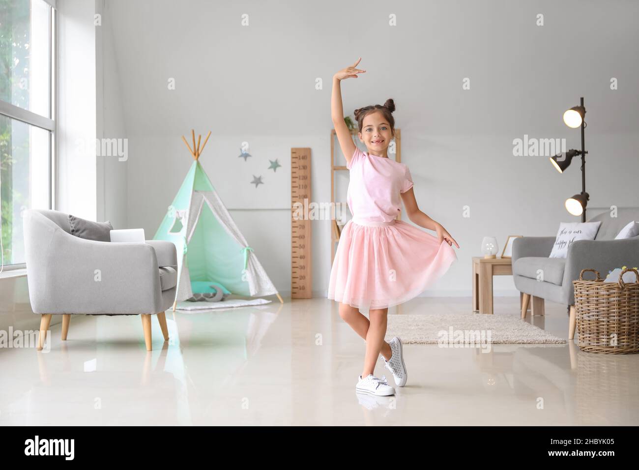 Adorable little ballerina dancing at home Stock Photo - Alamy