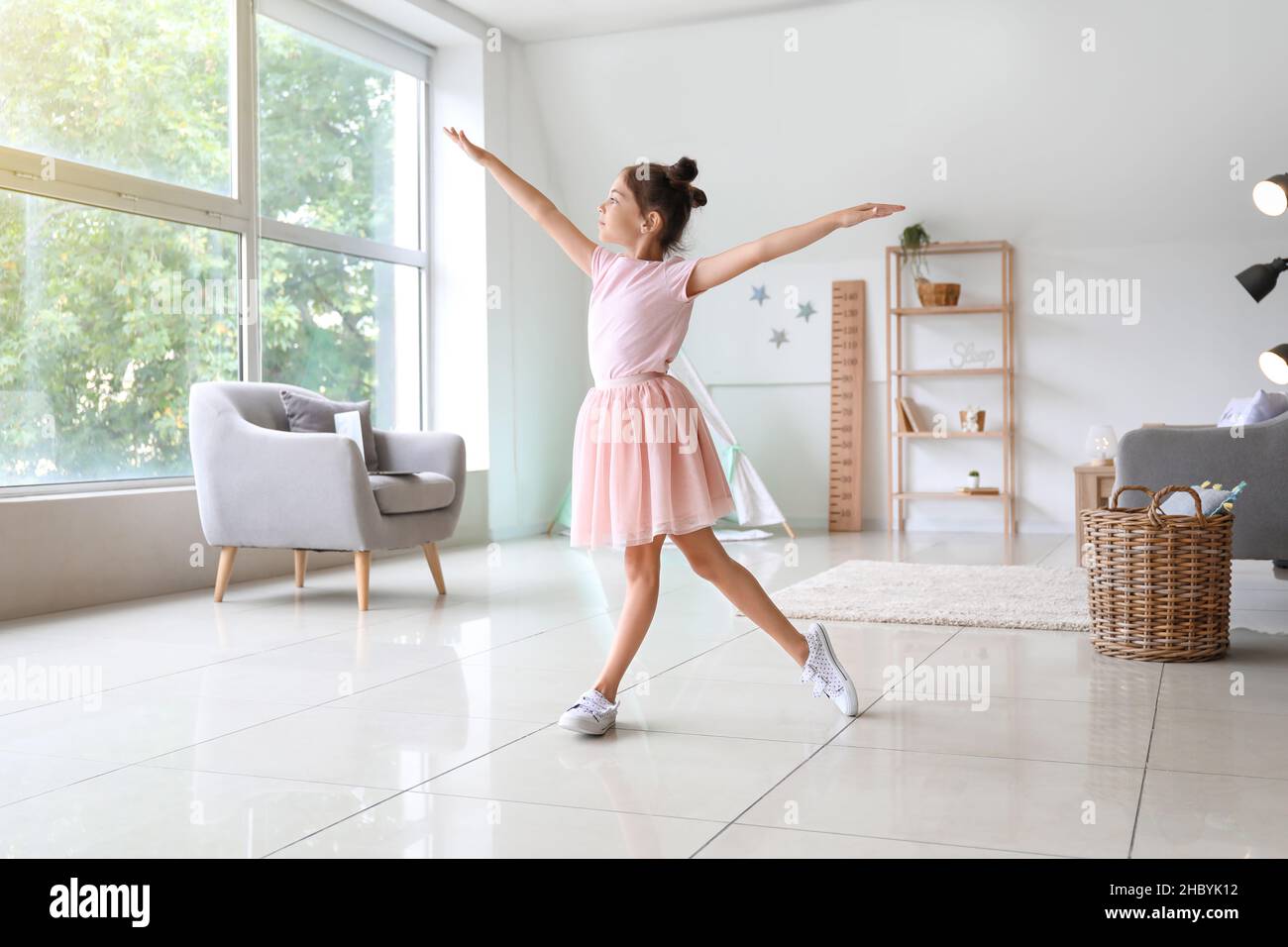 Adorable little ballerina dancing at home Stock Photo - Alamy