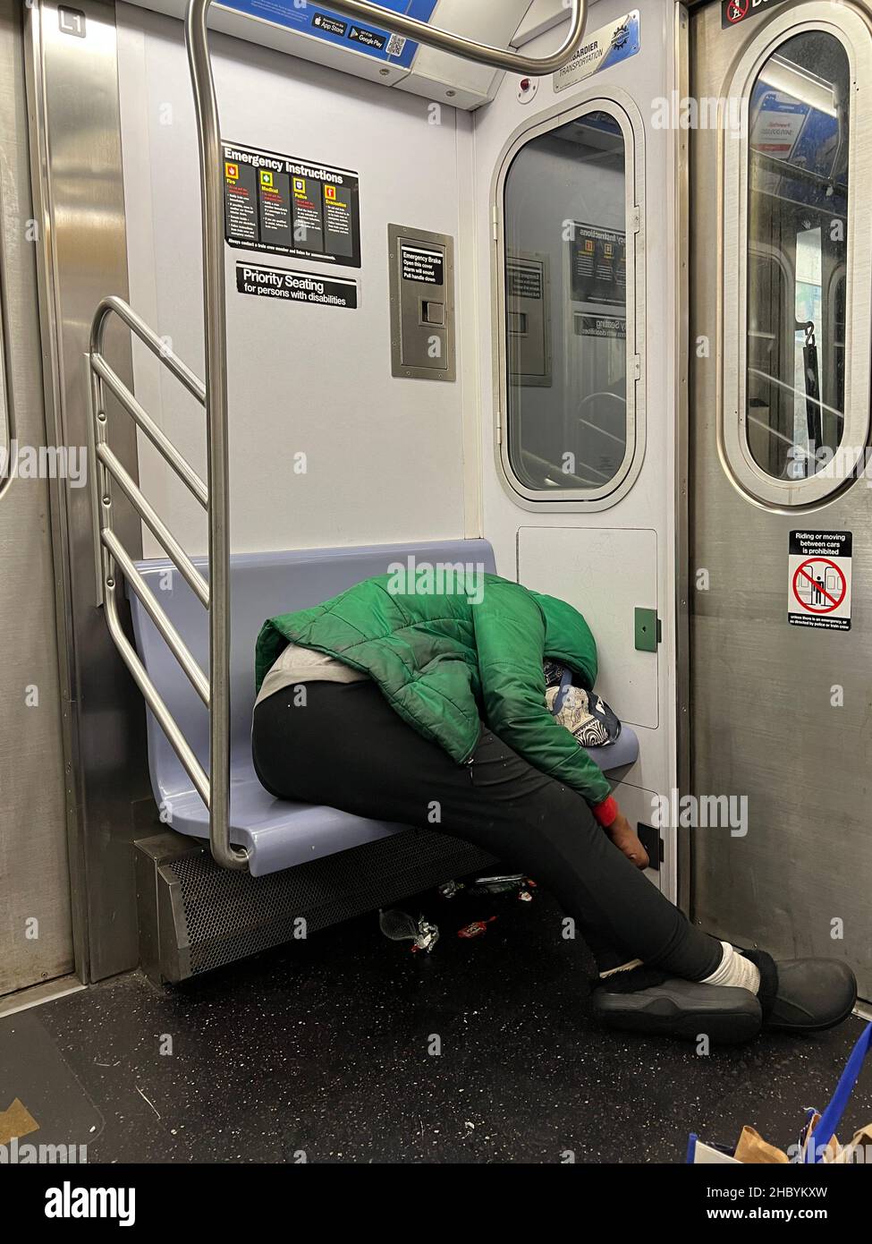 Homeless person sleeps on a New York City subway train in Brooklyn, New ...