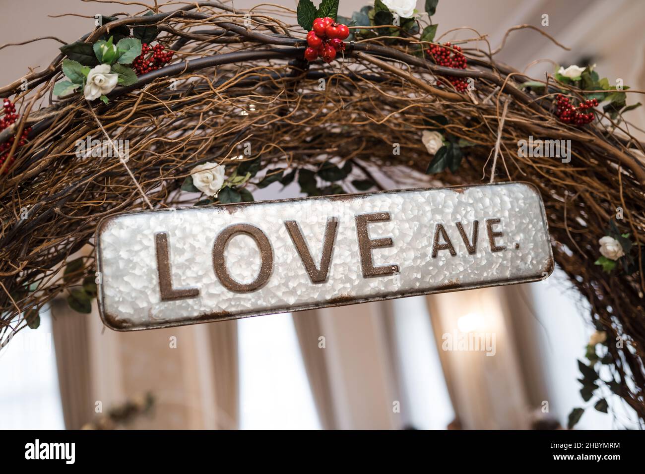 Love Avenue Ave wooden branch archway with metal plate street sign ...