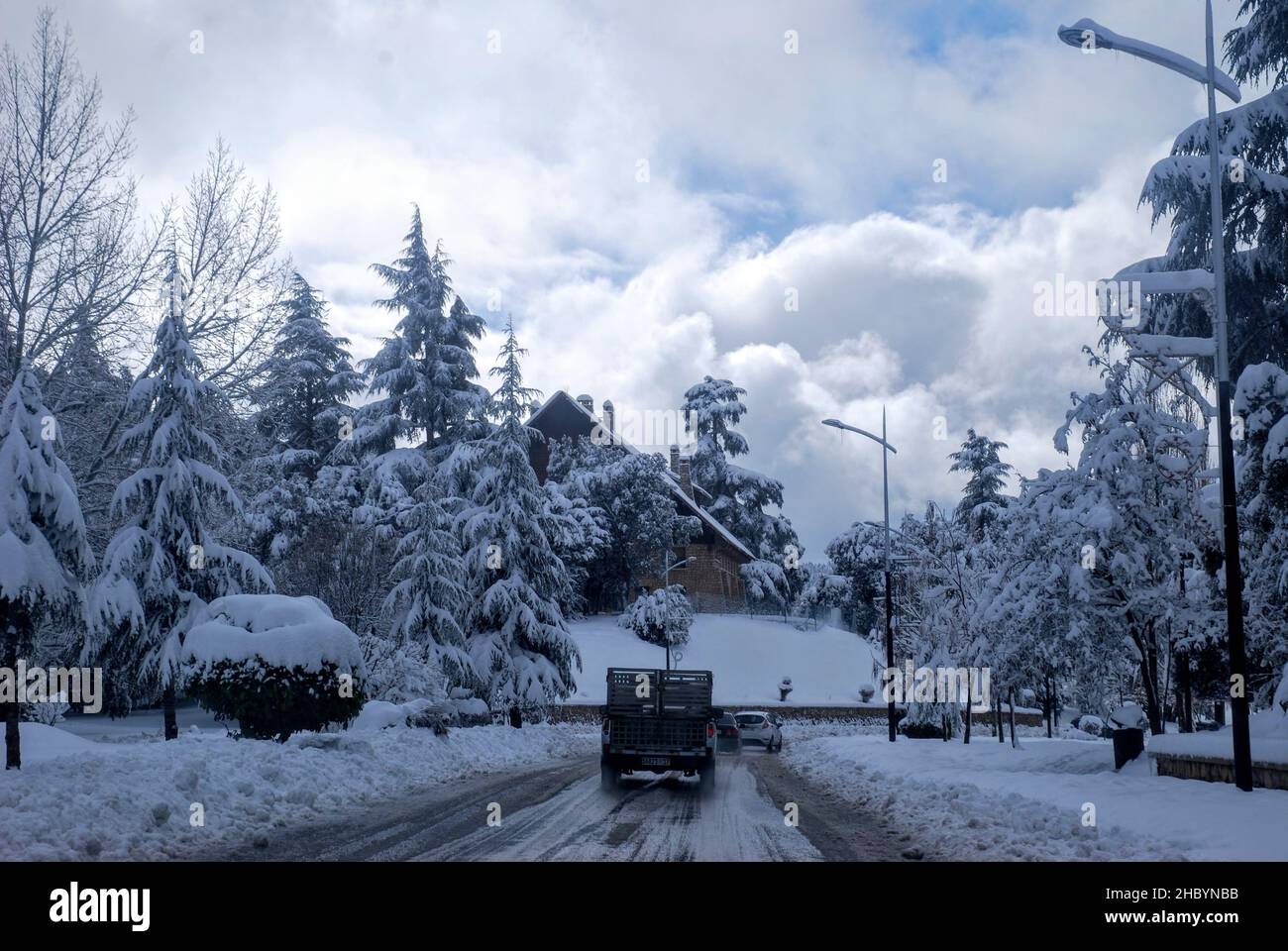 A HOUSE COVERED BY THE SNOW LOOKS LIKE A SCARY FACE, THE WINTER IN ...