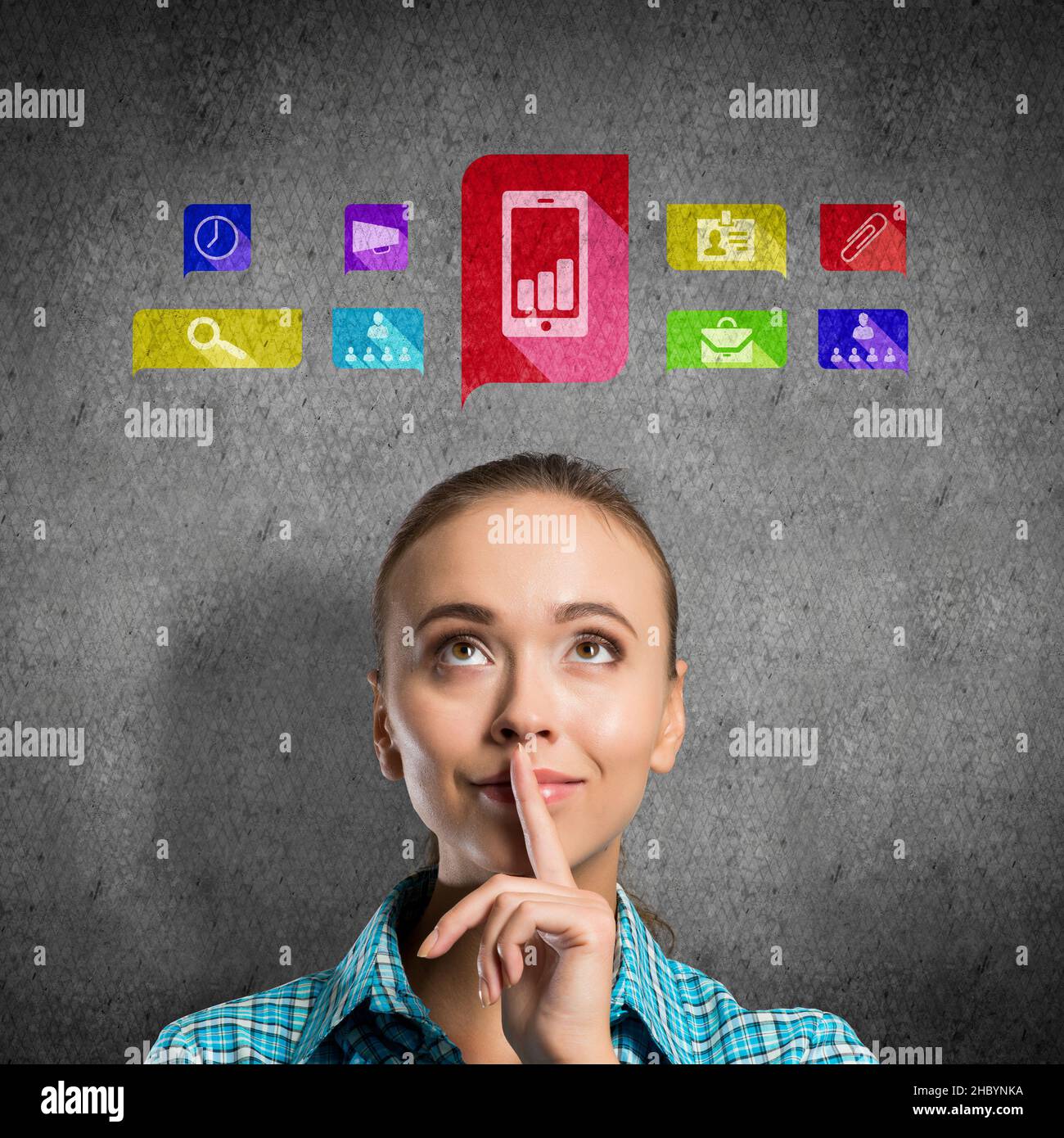 Girl showing hush gesture Stock Photo - Alamy
