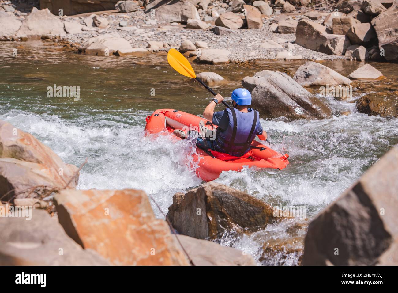 inflatable raft extreme sport at mountain river Stock Photo - Alamy